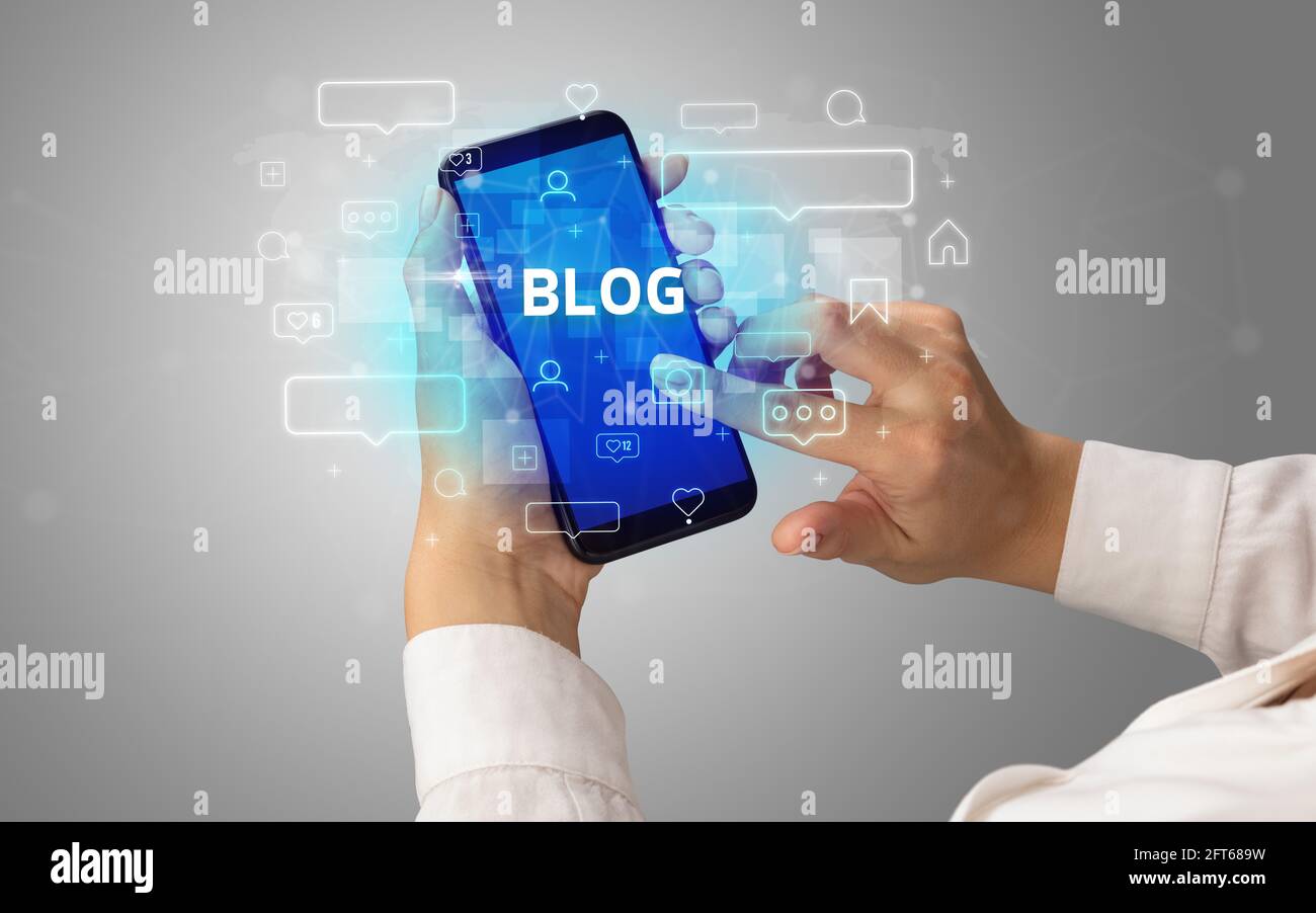 Hand using smartphone with social media concept Stock Photo - Alamy