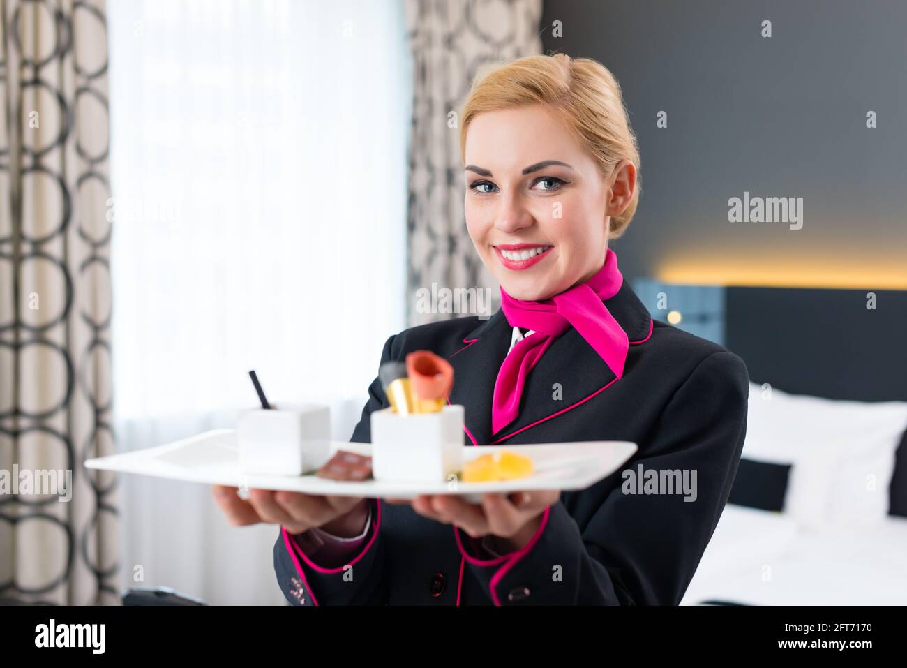 Room service serving sweet VIP dessert in design hotel on room Stock ...