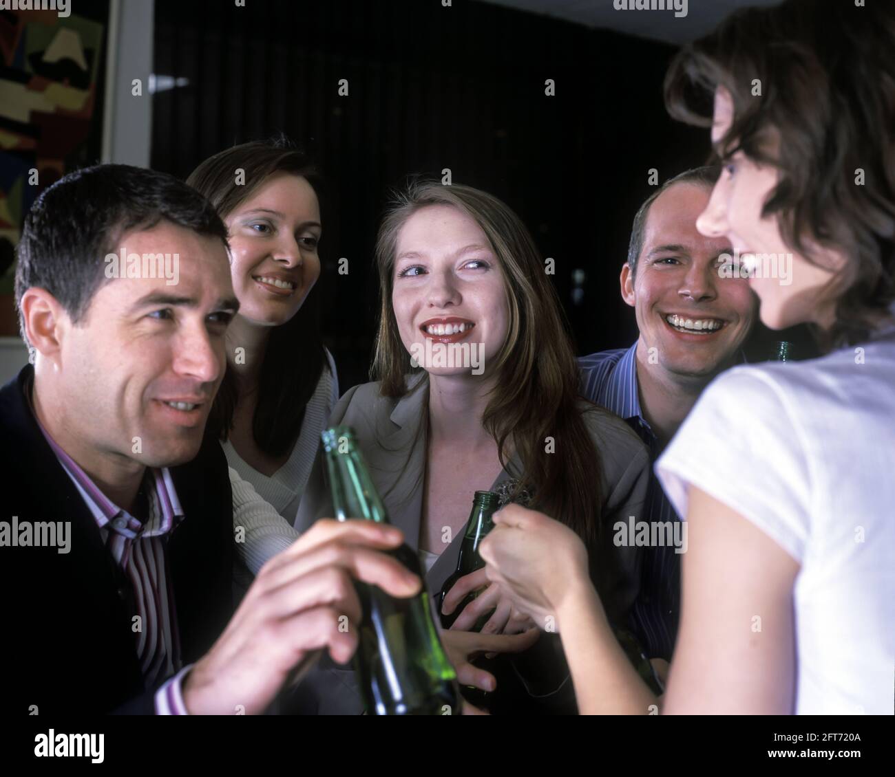 Office workers drinking alcohol hi-res stock photography and images - Alamy