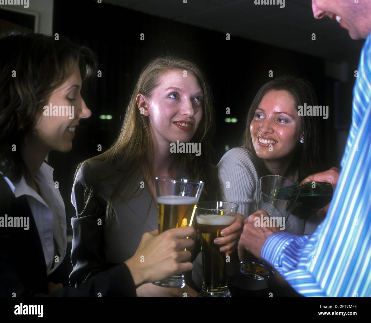 2005 HISTORICAL CAUCASIAN OFFICE WORKERS TOAST AT BAR DRINKING BEER ALL ...