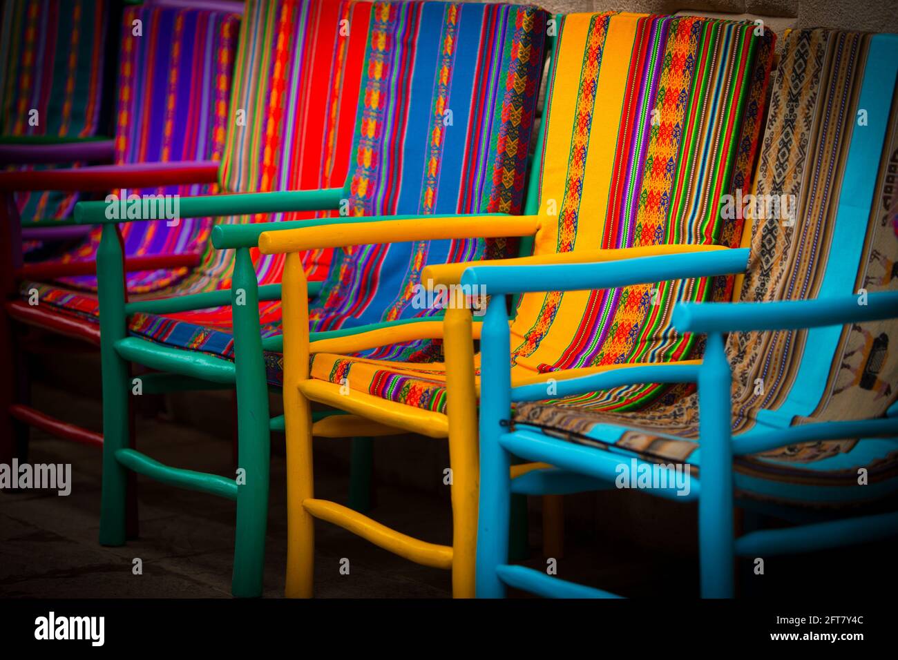 Handmade Colorful Peruvian Chairs in a Row Stock Photo - Alamy