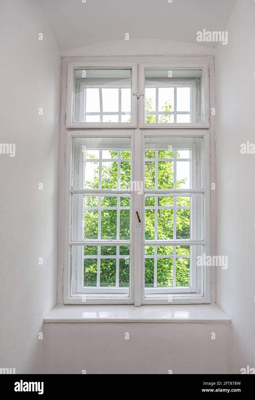 An old white window at the entrance of an house Stock Photo - Alamy