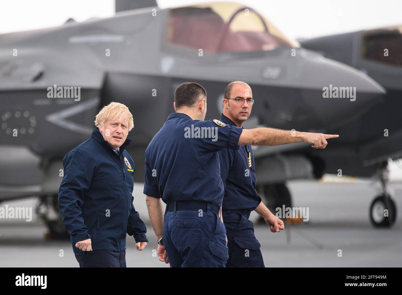 (Left to right) Prime Minister Boris Johnson, Commodore Steve Moorhouse ...