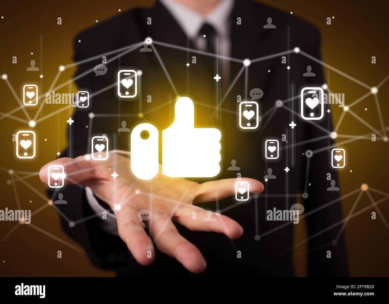 Hand holding social media icons Stock Photo - Alamy