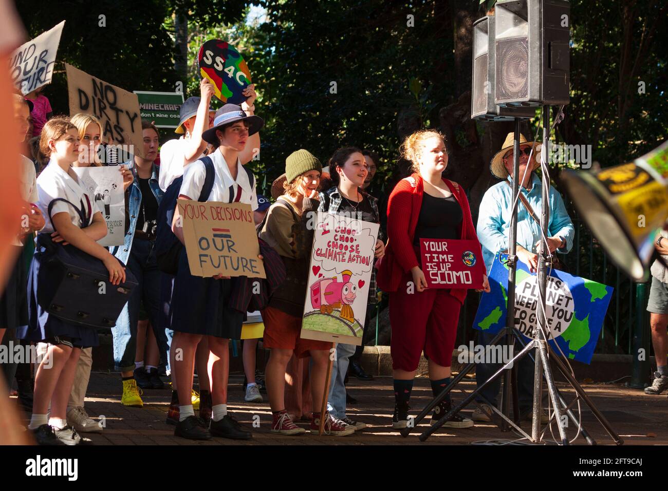 Protesters hold placards during the demonstration.Thousands of students ...