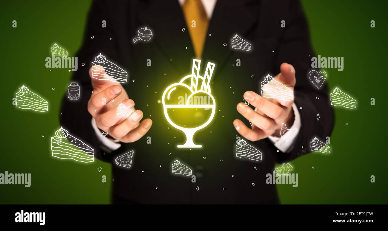 Hand holding food related icons Stock Photo - Alamy