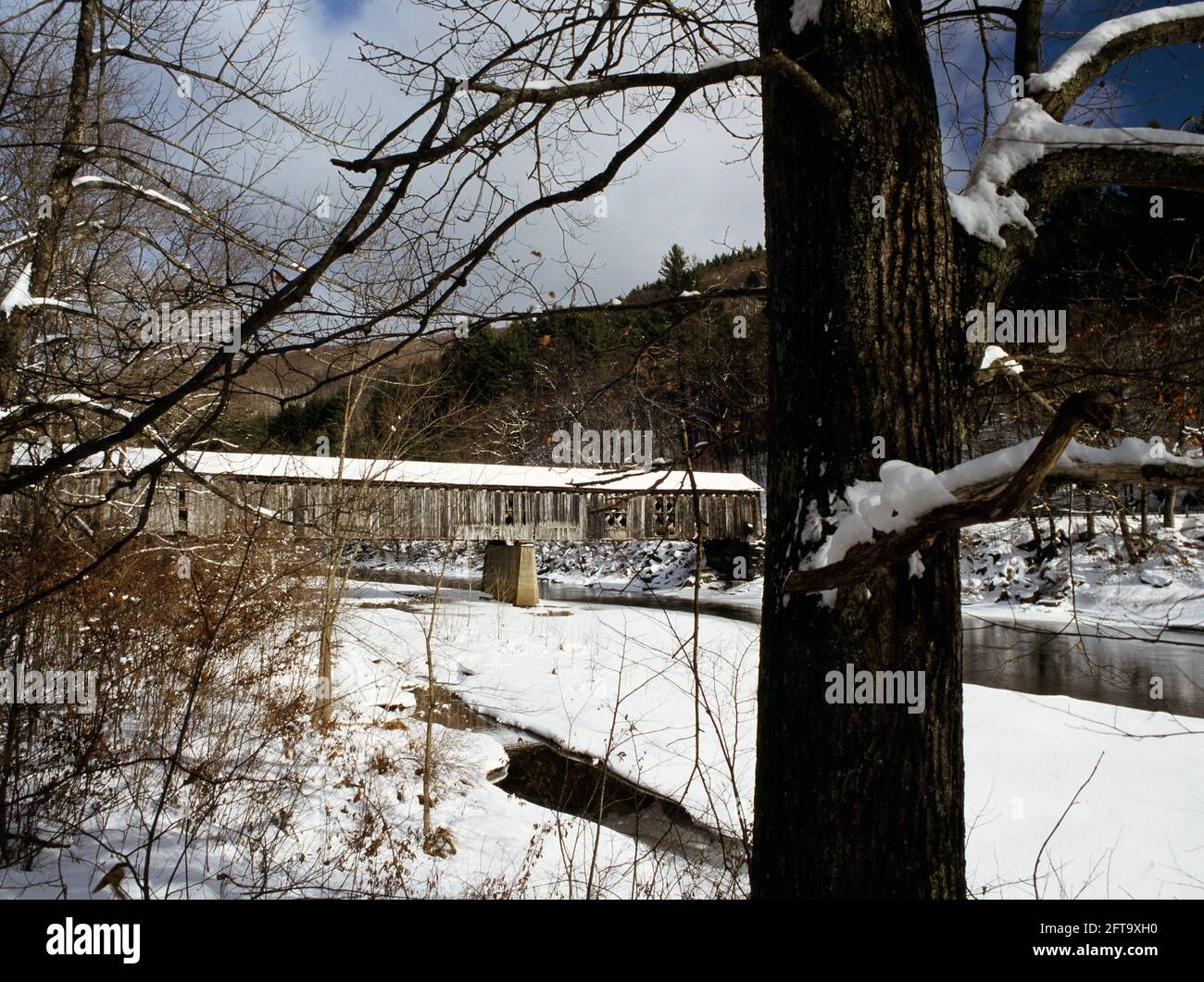 Vermont's Scott Covered Bridge in snow Stock Photo - Alamy