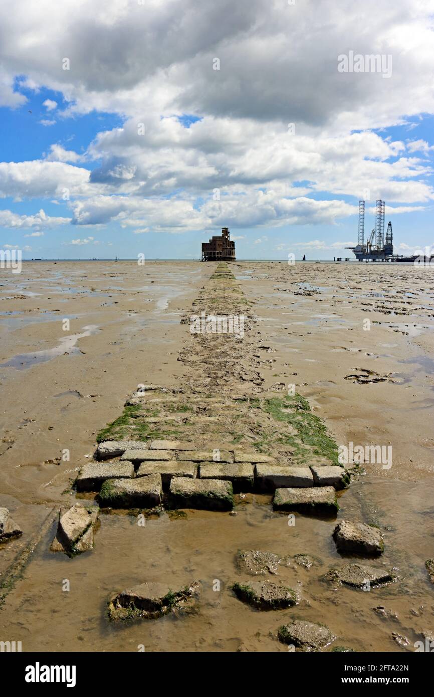 Causeway to Grain Tower Battery on the Medway Estuary Kent Stock Photo ...