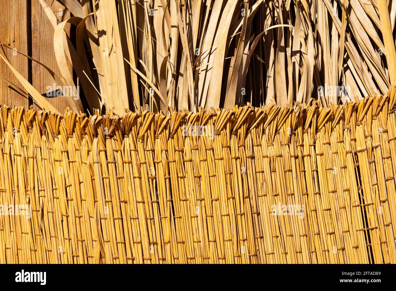 Woven straw texture with dried palm leaves on background. Handmade ...