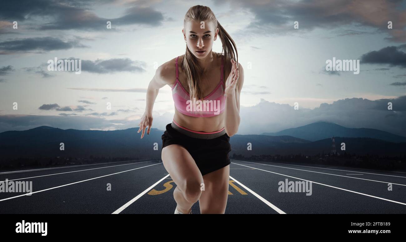 Professional female runner, jogger on road and sky background ...