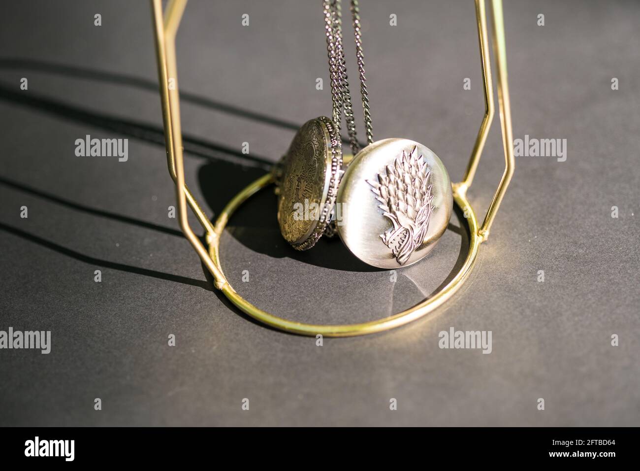 Pocket watch with a wolf head design closeup. Selective Focus Stock ...
