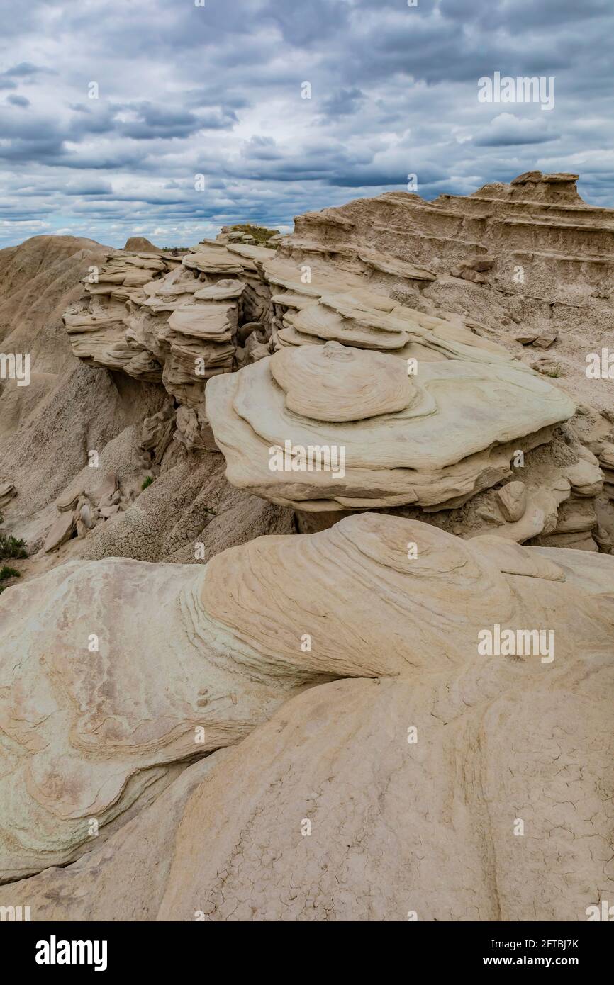 Sandstone formations atop solfter clay in Toadstool Geologic Park ...