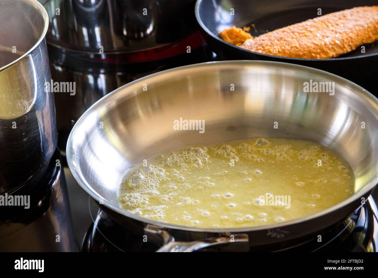 Melted butter in iron pan hi-res stock photography and images - Alamy