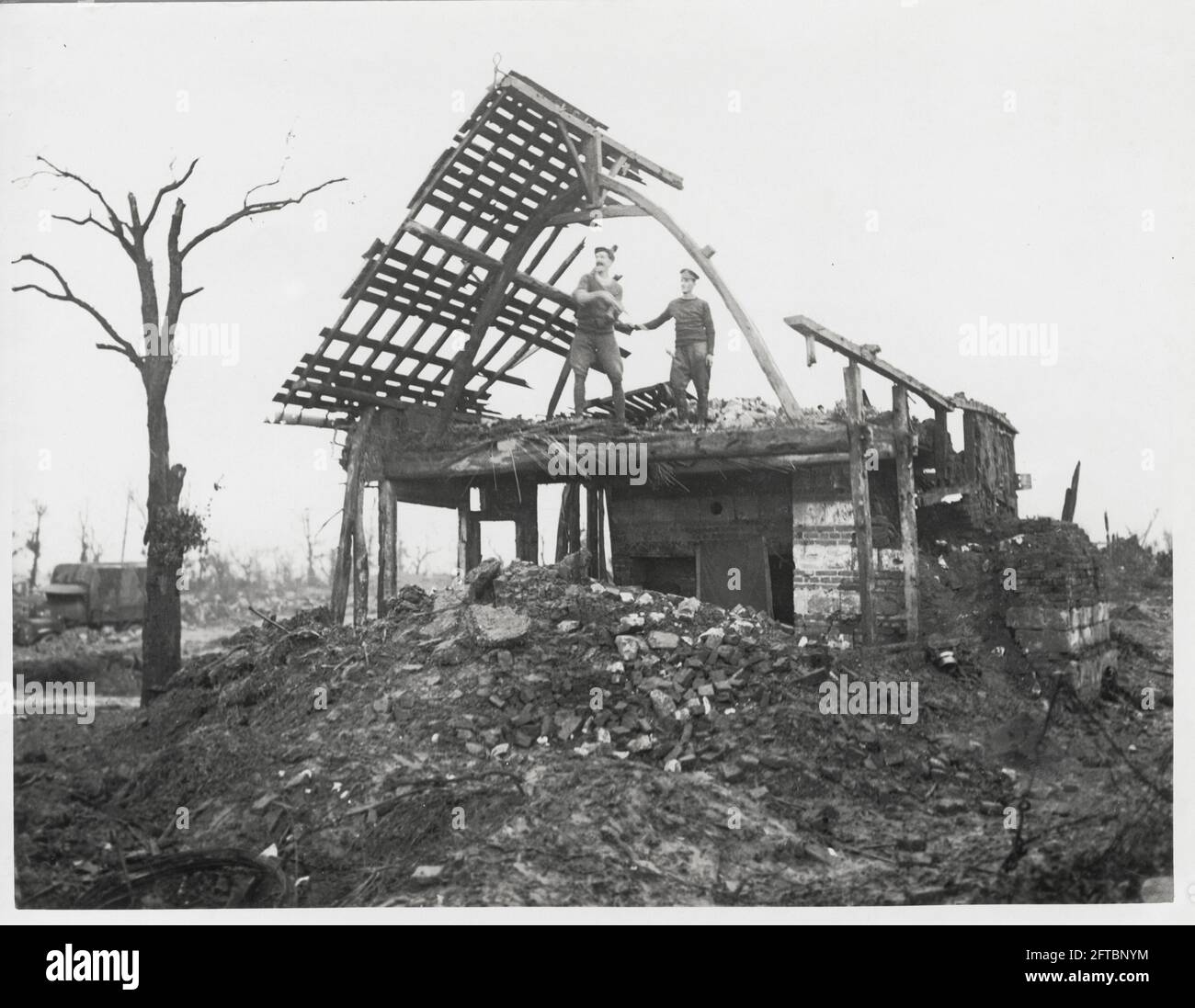 World War One, WWI, Western Front - Two men stand on the remains of a ...