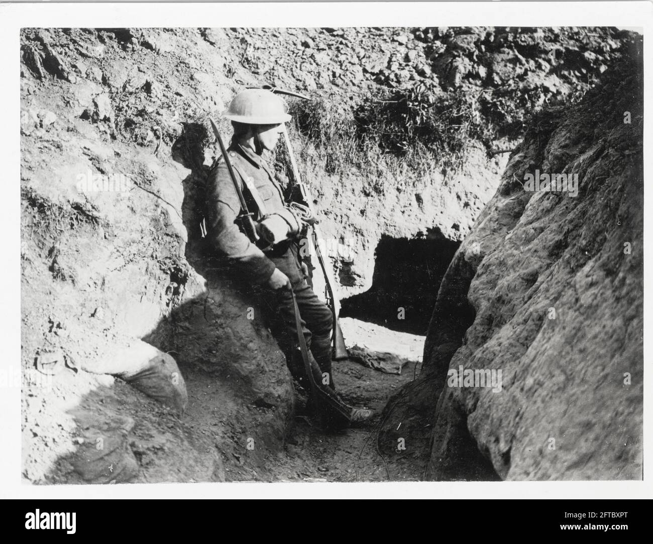World War One, WWI, Western Front - A lone sentry with rifle in a ...