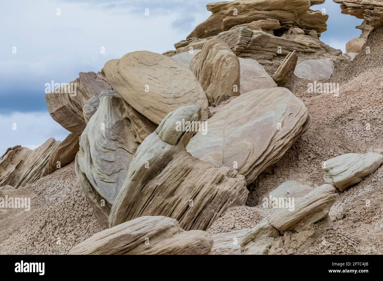 Sandstone formations atop solfter clay in Toadstool Geologic Park ...