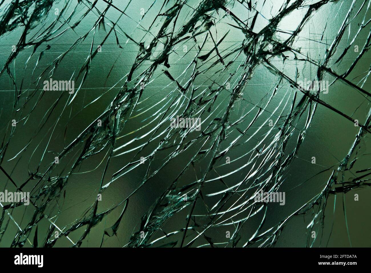 Broken green glass texture background Stock Photo - Alamy