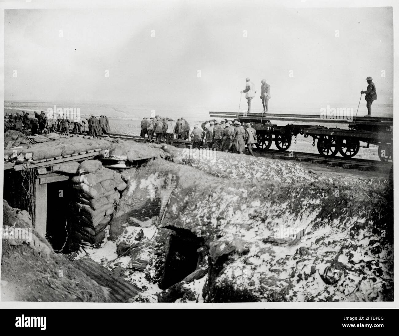 World War One, WWI, Western Front - Troops laying a railroad over newly ...