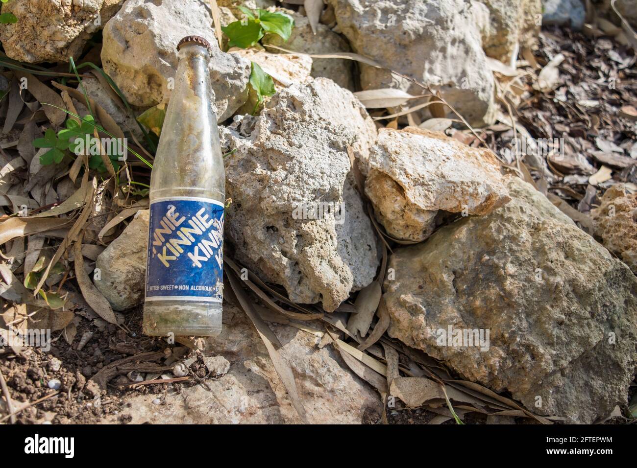 RAB, MALTA - Dec 29, 2019: An old glass bottle of Kinnie, a Maltese ...