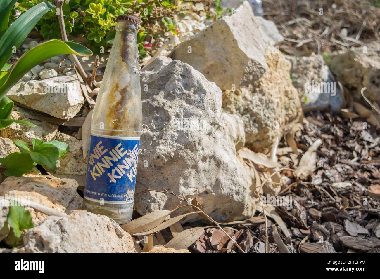 RAB, MALTA - Dec 29, 2019: An old glass bottle of Kinnie, a Maltese ...