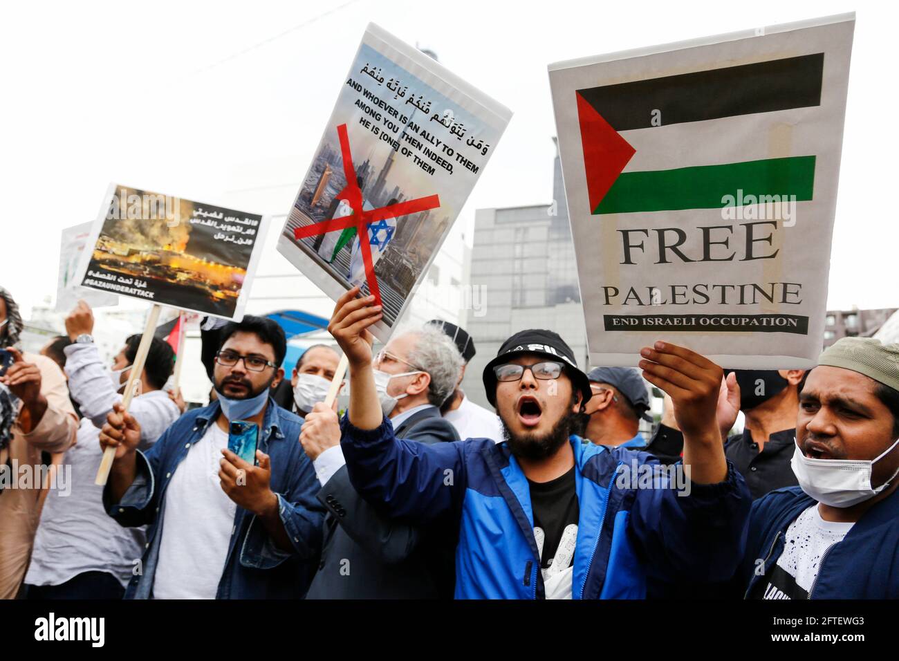 Tokyo, Japan. 21st May, 2021. Palestine supporters holding placards ...