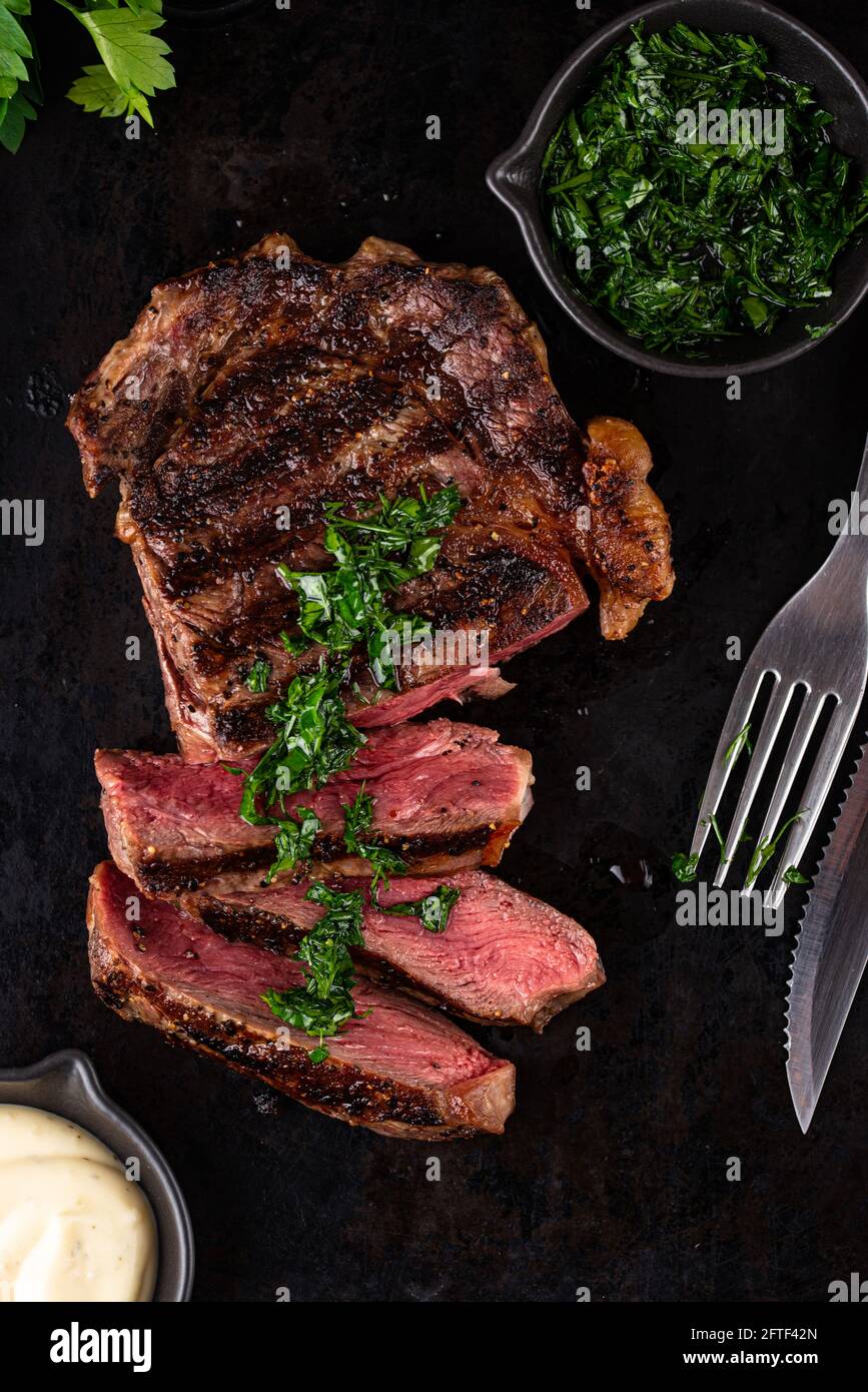 Grilled marbled rib eye steak Stock Photo - Alamy