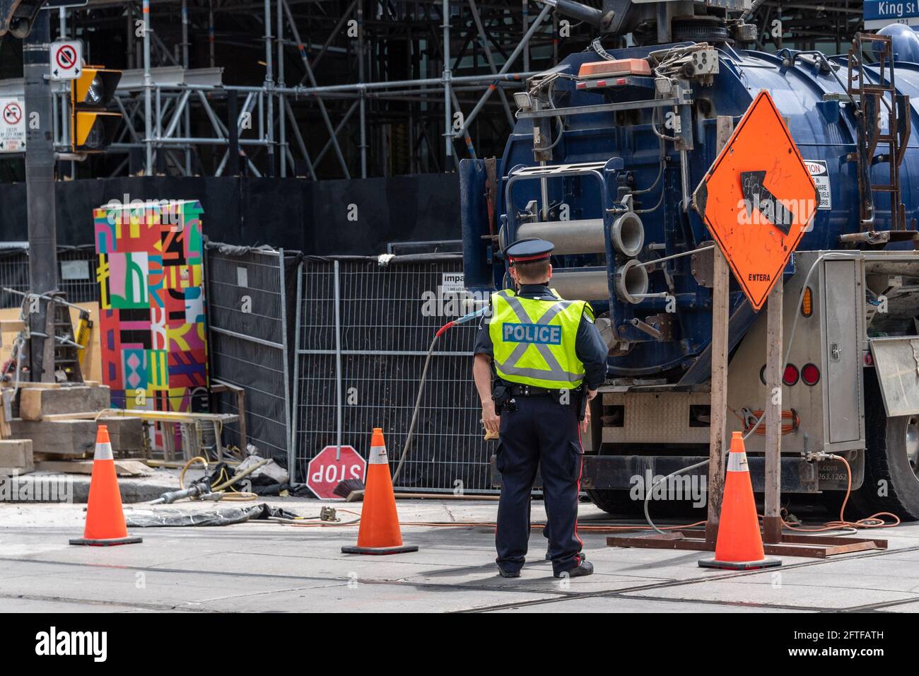 Police officers serving in a construction site in King Street in the ...