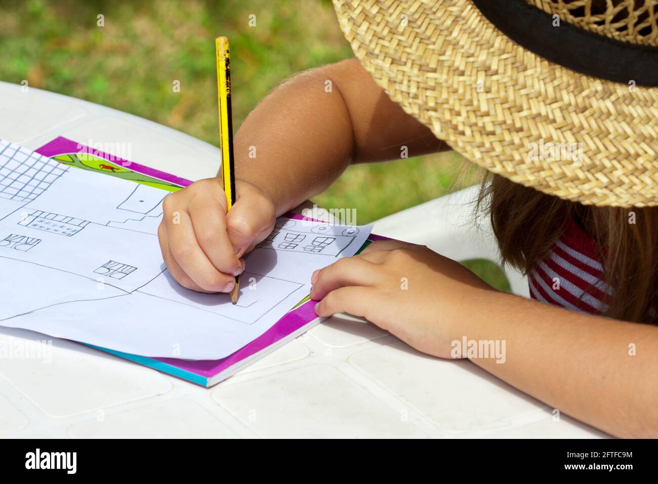 girl writing and drawing Stock Photo - Alamy