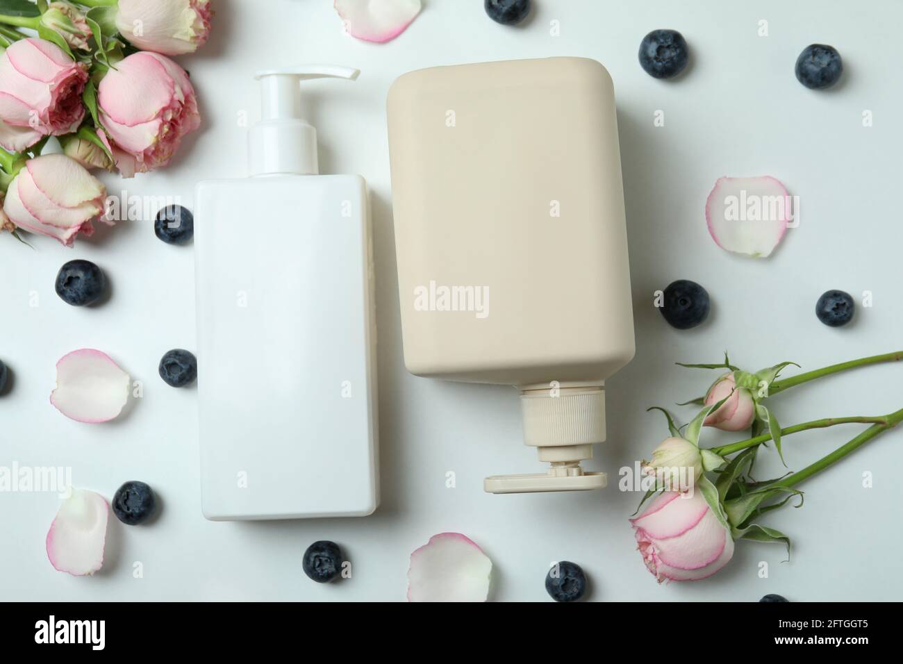 Natural shower gel and ingredients on white background Stock Photo - Alamy