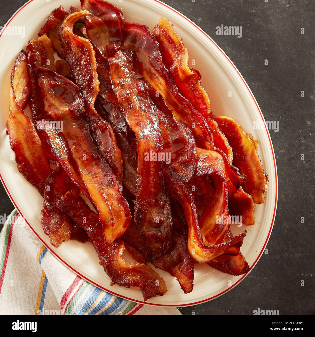 Maple syrup glazed bacon Stock Photo - Alamy