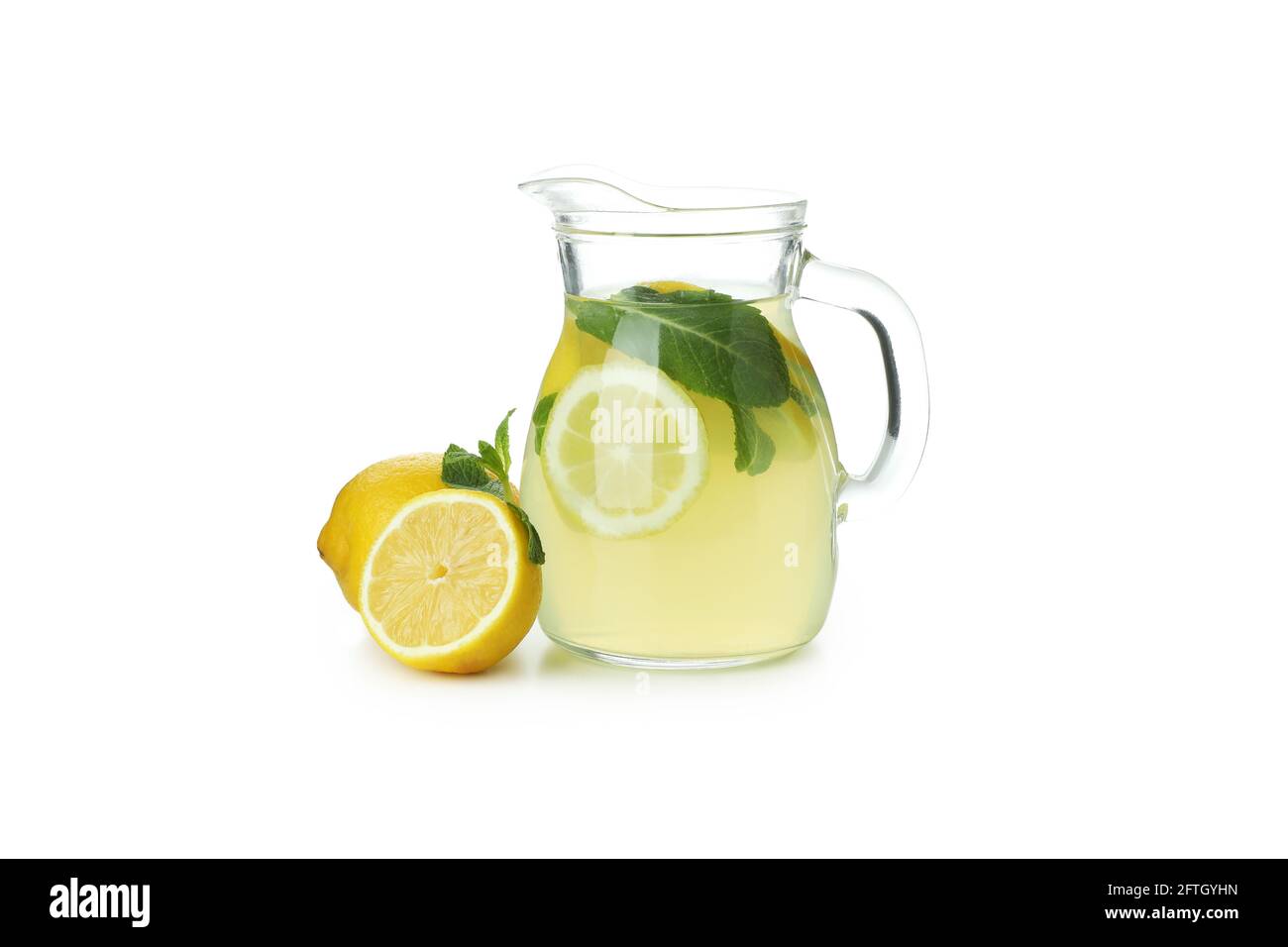 Jug of lemonade isolated on white background Stock Photo - Alamy