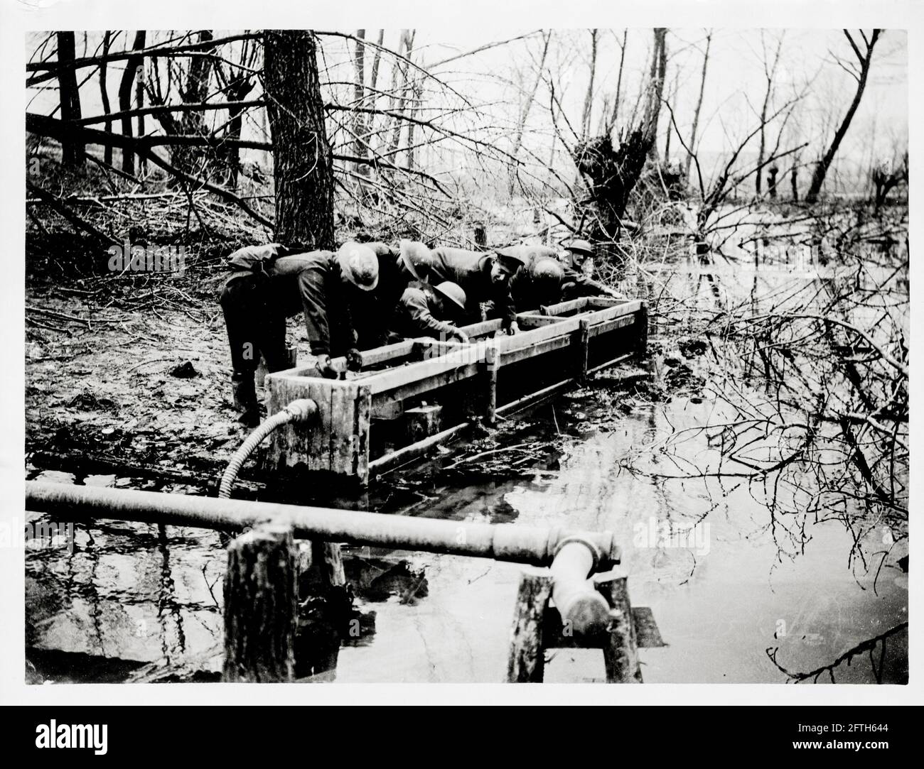 World War One, WWI, Western Front - Troops fill their water cans from a ...