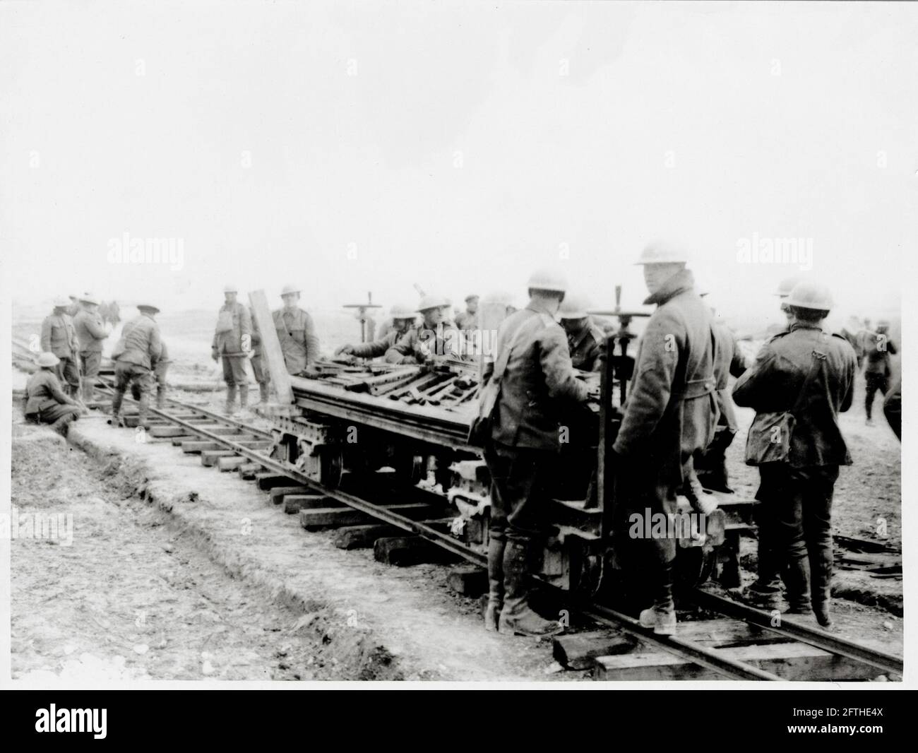 World War One, WWI, Western Front - Men at work making a light railway ...