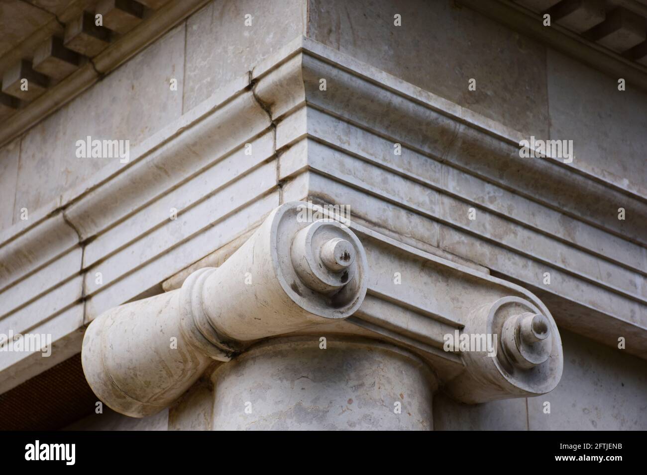 antique style classic stone column head and frieze closeup detail. old ...