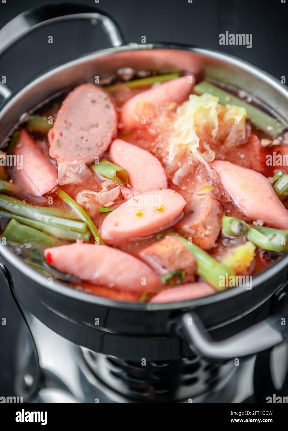 Spicy Yen Tafo Soup with Fish Ball in Stainless Steel Hot Pot Stock ...