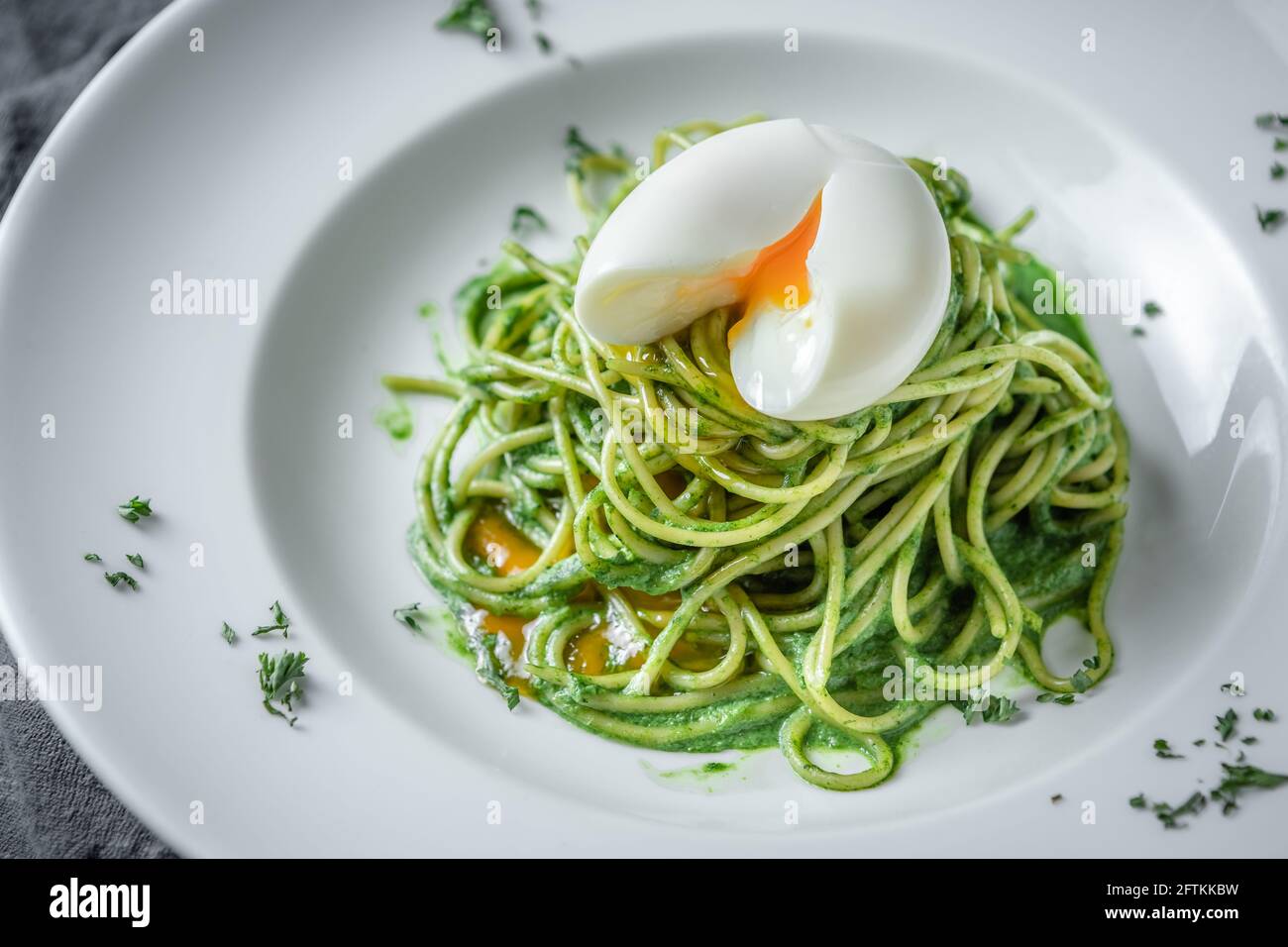 A Dish of Vegetarian Pesto Spaghetti with Lava Egg Stock Photo - Alamy