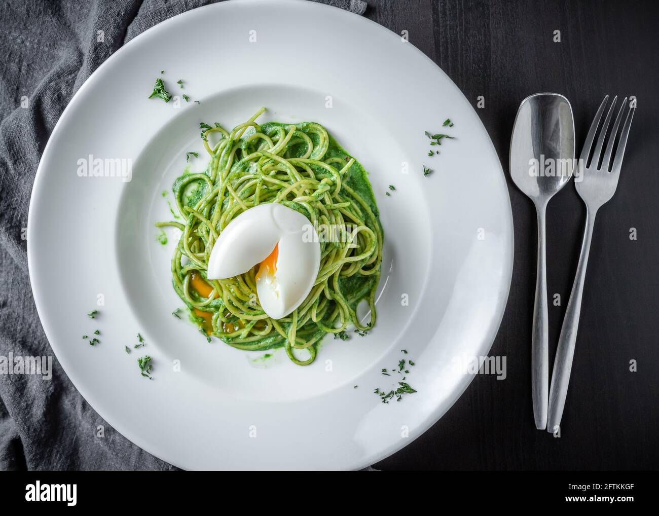 A Dish of Vegetarian Pesto Spaghetti with Lava Egg Stock Photo - Alamy