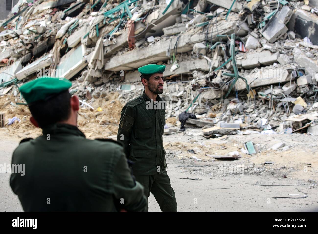 Palestinian security seen near destroyed binding in Gaza.A ceasefire ...