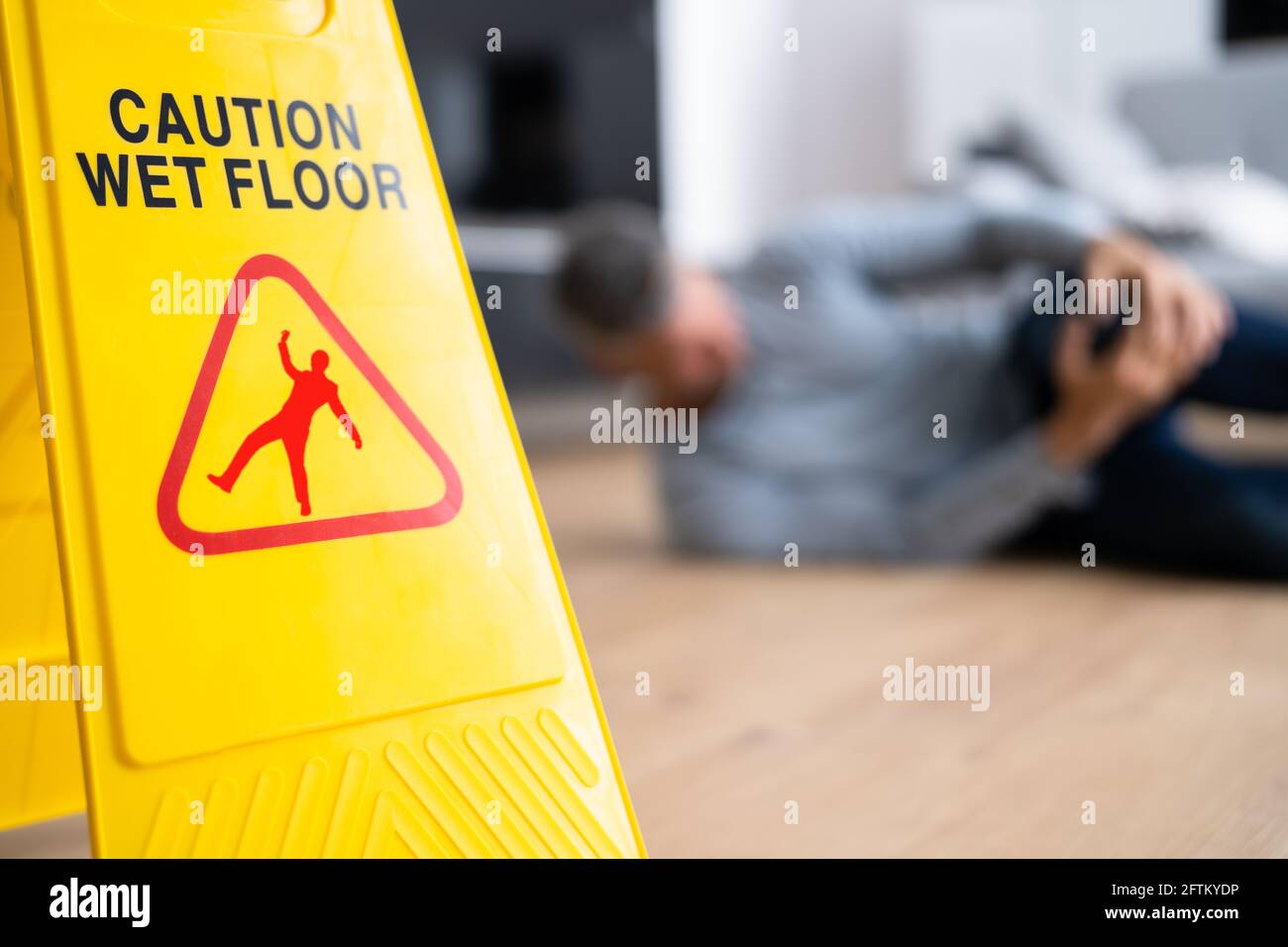 Slip Fall Accident. Floor Sign Caution And Safety Stock Photo - Alamy