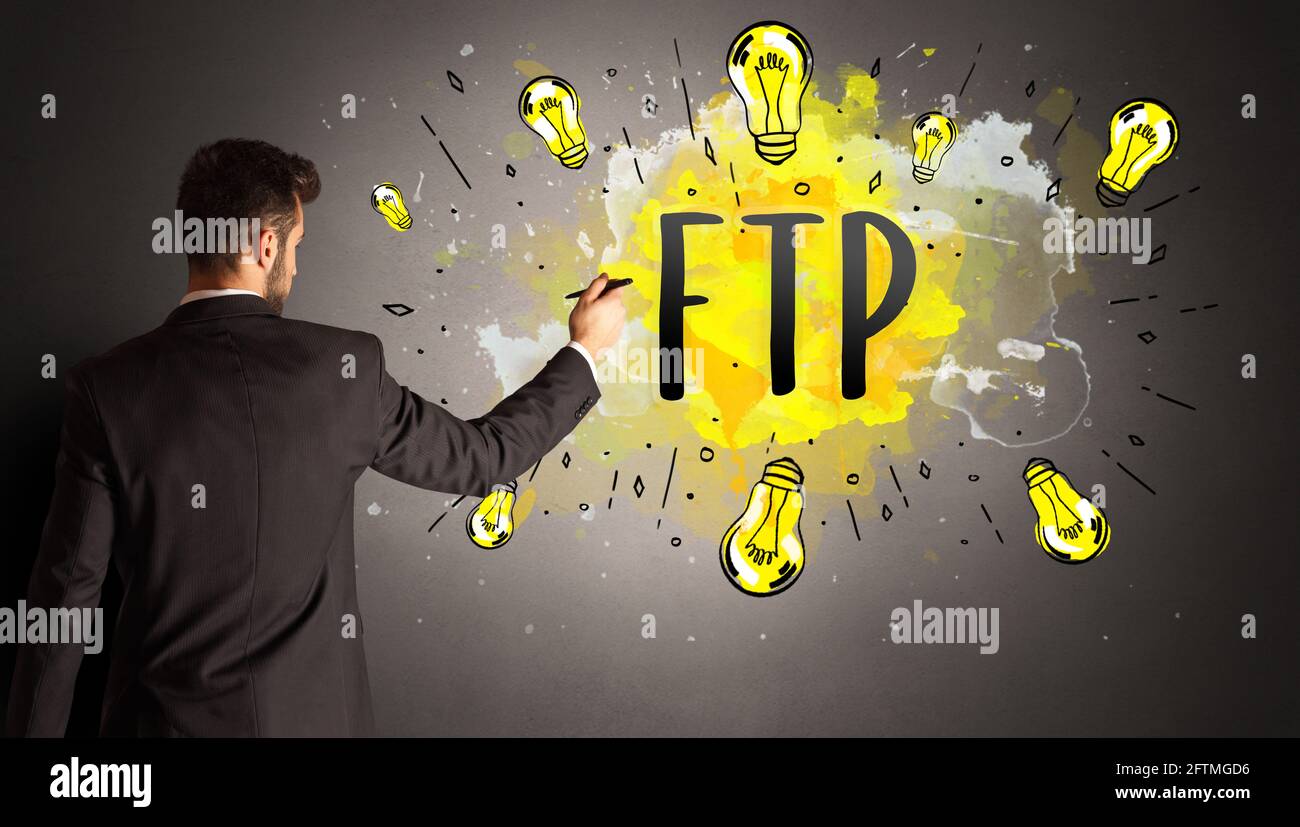 man drawing colorful light bulb Stock Photo - Alamy