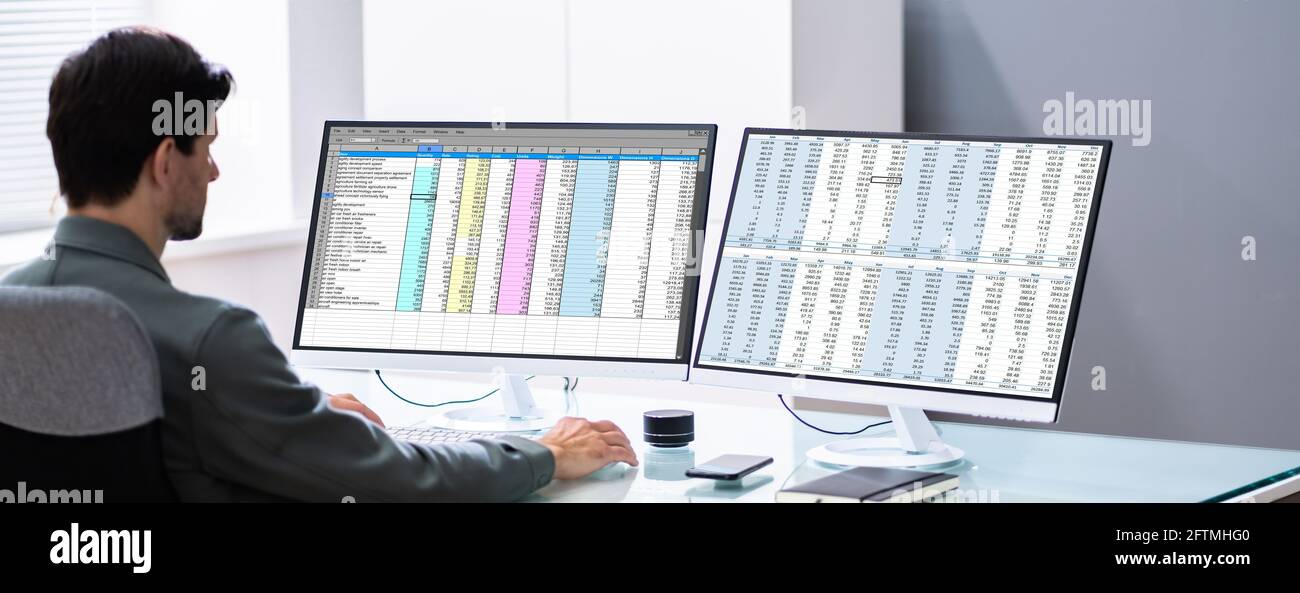 Auditor Spreadsheet Report On Desktop Computer Screen Stock Photo - Alamy