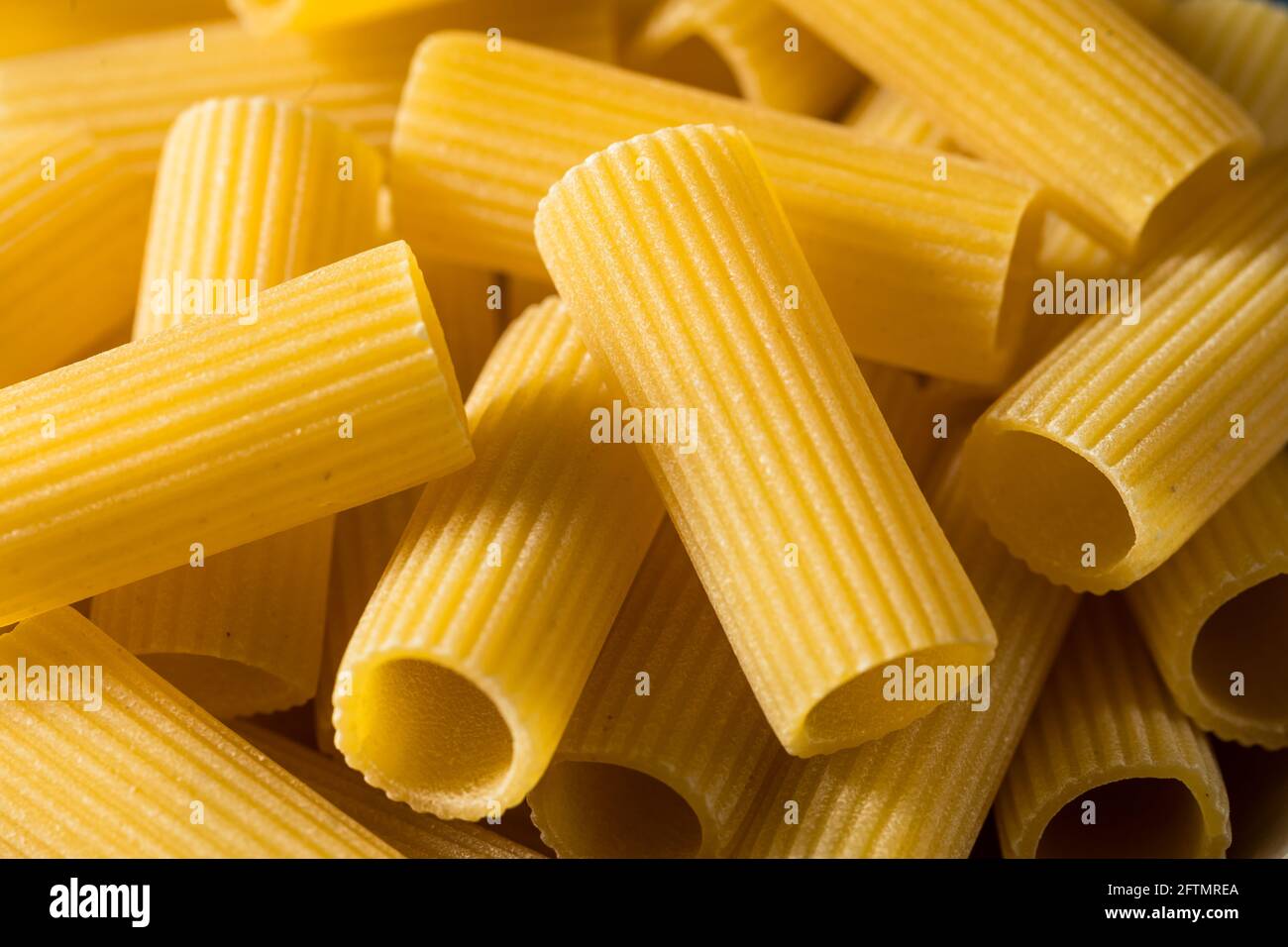 Organic Dry Rigatoni Pasta in a Bowl Stock Photo - Alamy
