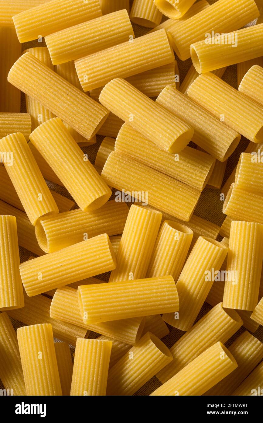 Organic Dry Rigatoni Pasta in a Bowl Stock Photo - Alamy