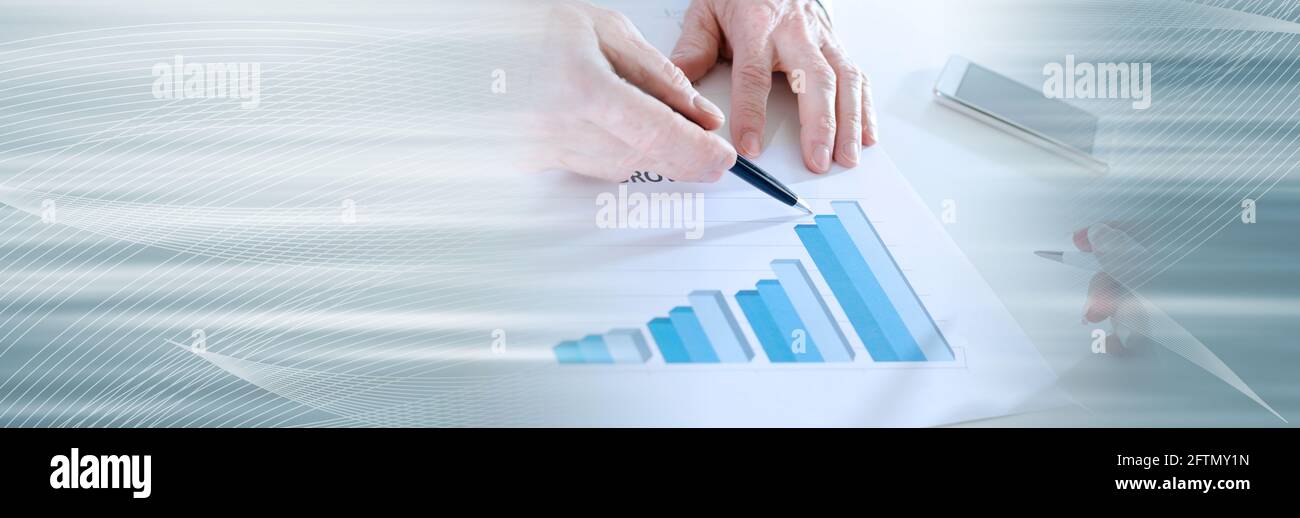 Analyzing growing results on a graphic; panoramic banner Stock Photo ...