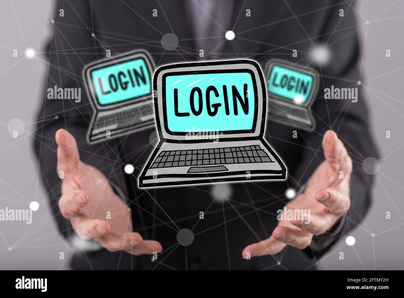 Login concept above the hands of a man in background Stock Photo - Alamy
