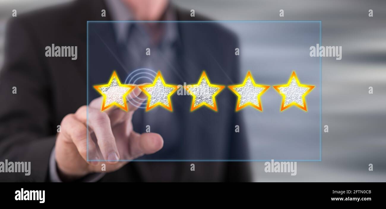 Man touching a quality concept on a touch screen with his finger Stock ...