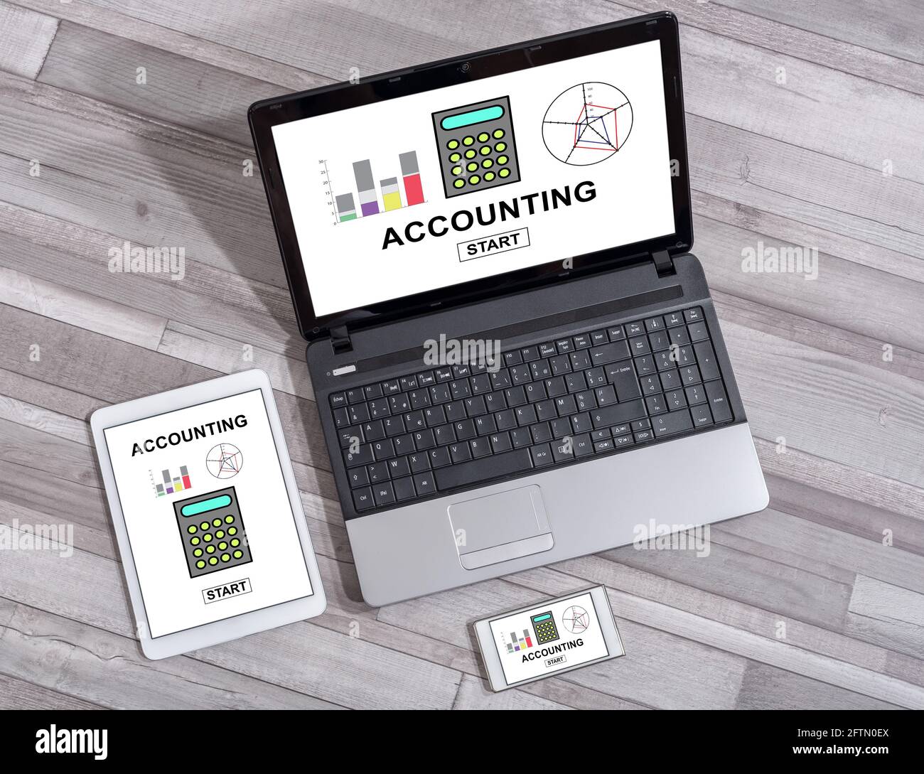 Accounting concept shown on different information technology devices ...