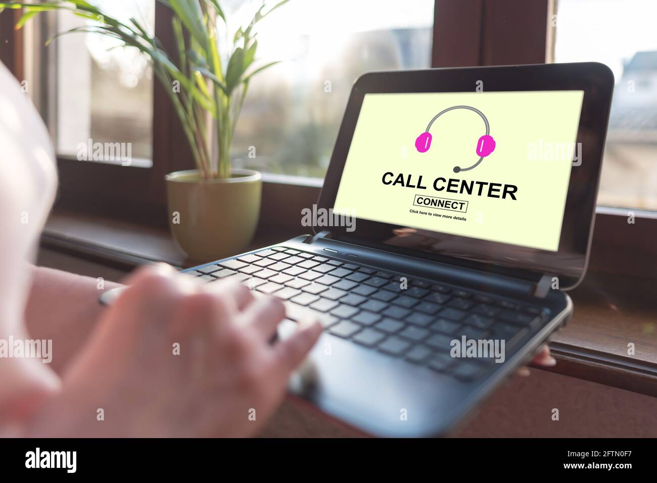 Laptop screen displaying a call center concept Stock Photo - Alamy