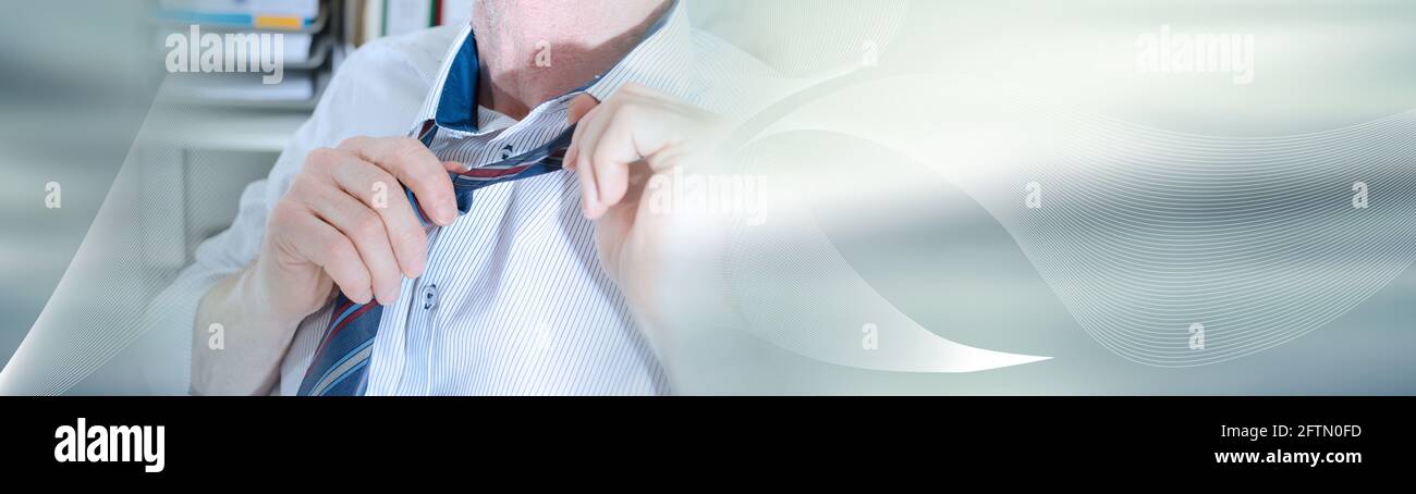 Businessman undoing his tie at office; panoramic banner Stock Photo - Alamy