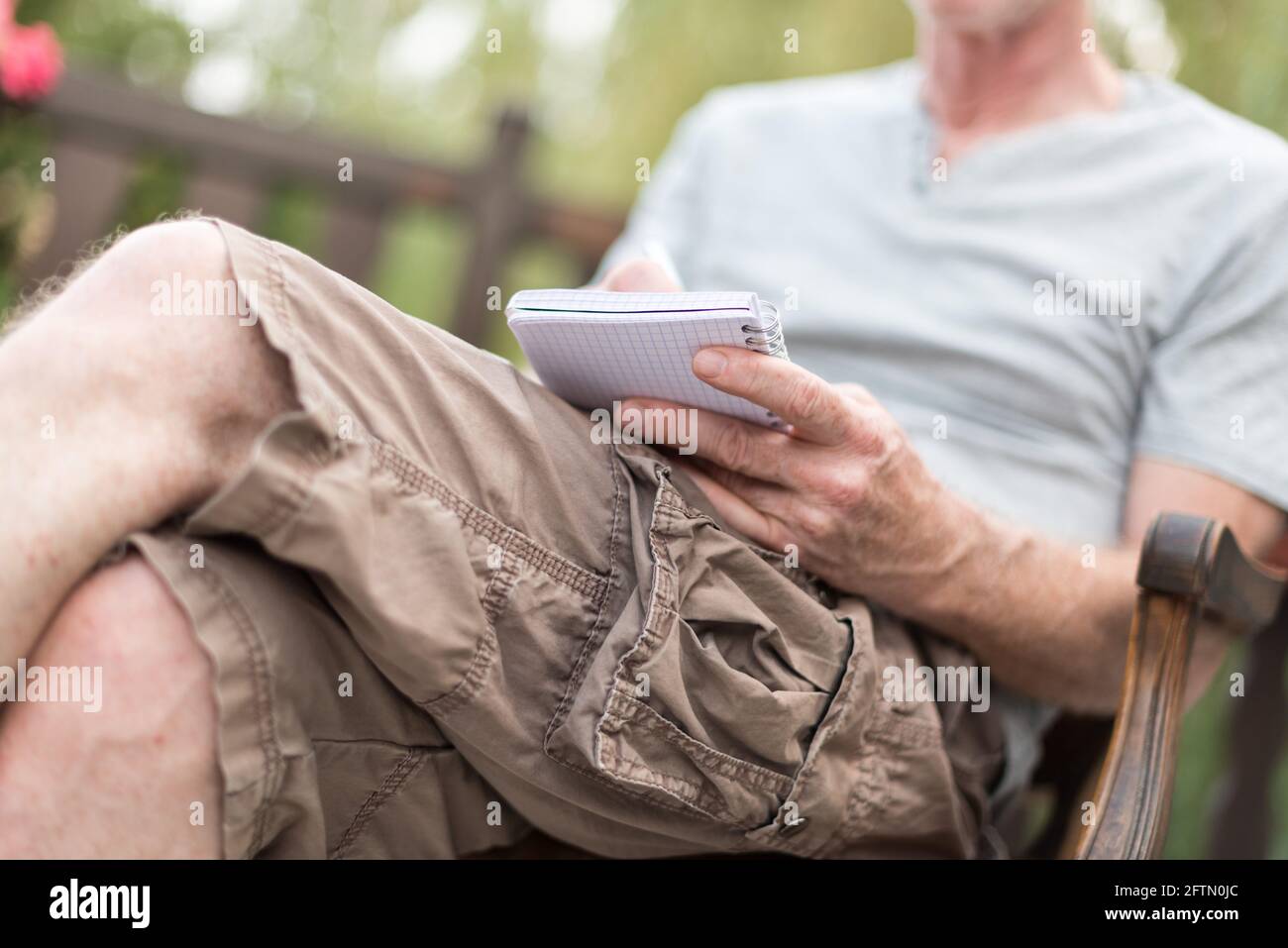 Man write book outdoor hi-res stock photography and images - Alamy